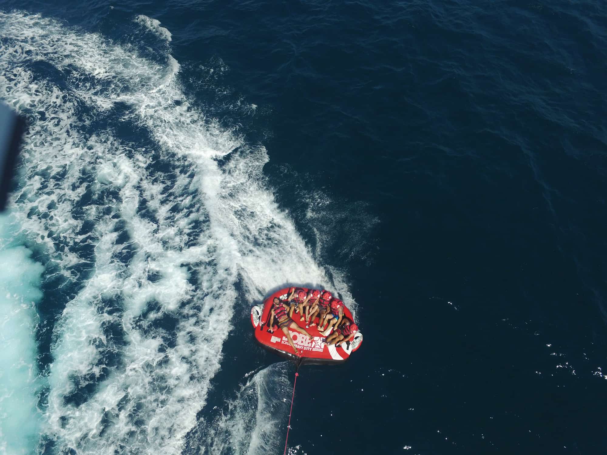 Crazy Sofa Boat Rides in Barcelona | Aguadoo | Barcelona Beach Activities