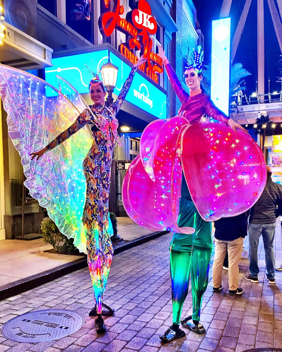 LED Flower and Butterfly Stilt Walkers Illuminate Las Vegas Promenade